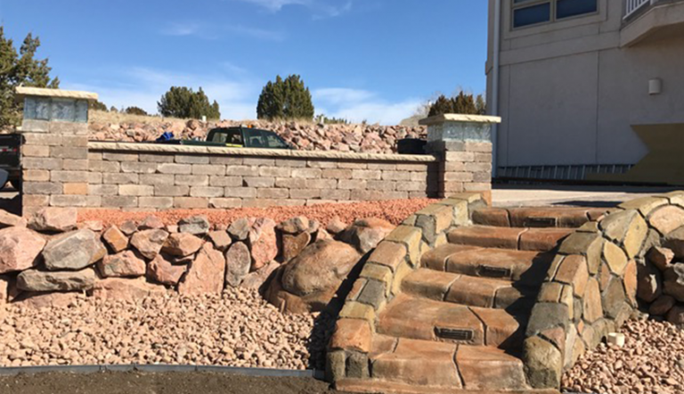 Custom_Stone_Retaining_Wall_Stairs - Above & Beyond Lawn & Landscaping